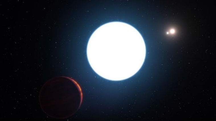 Astronomers spy giant planet, three stars in odd celestial ballet ...