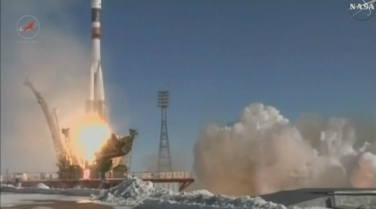 Unmanned Russian Progress 66 Rocket docks with International Space ...