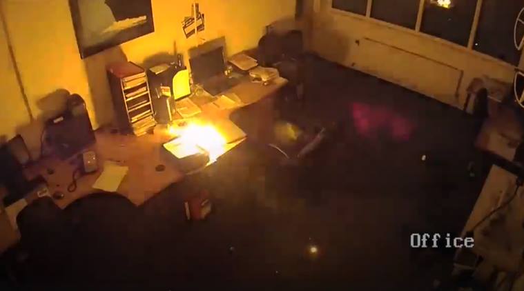 WATCH: Laptop bursts into flames, fire spreads in office building ...