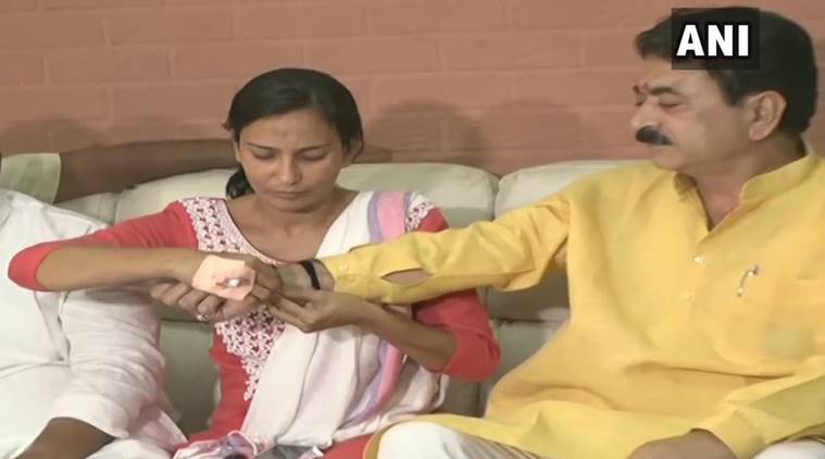 Gujarat BJP MLA Balram Thawani assaults woman, then says sorry, gets her to tie him rakhi ...