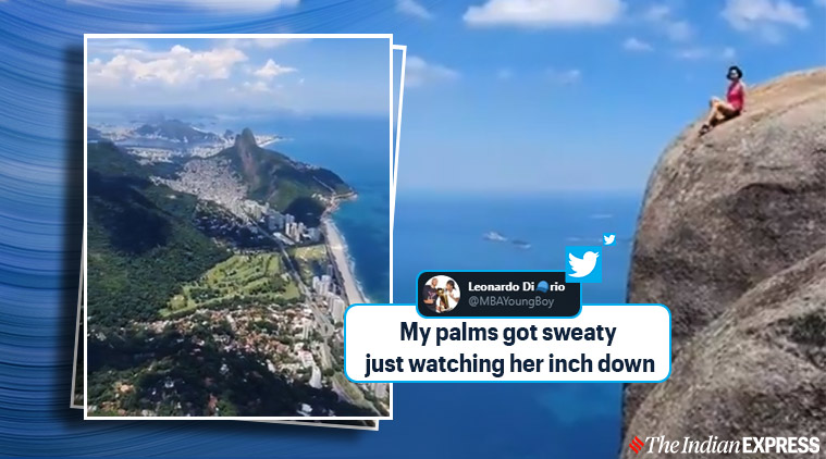 Video of a woman posing at the edge of 3,000 ft high rock makes netizens anxious | Trending News ...