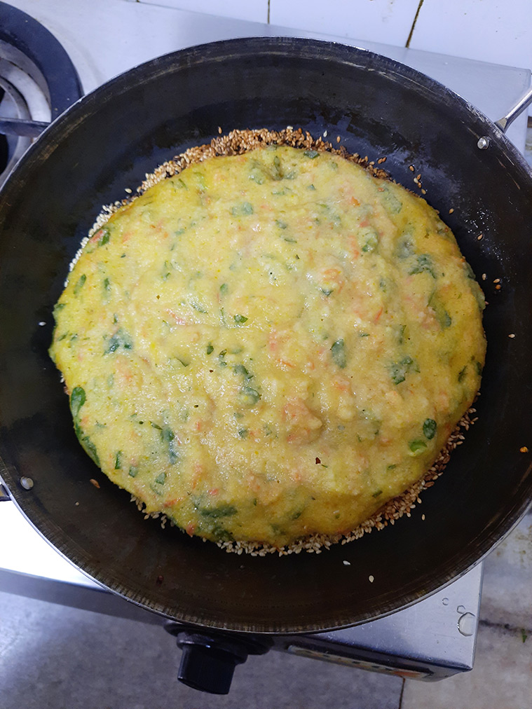 The Back Burner: Handvo, the savoury ‘cake’ with the crispest, most ...