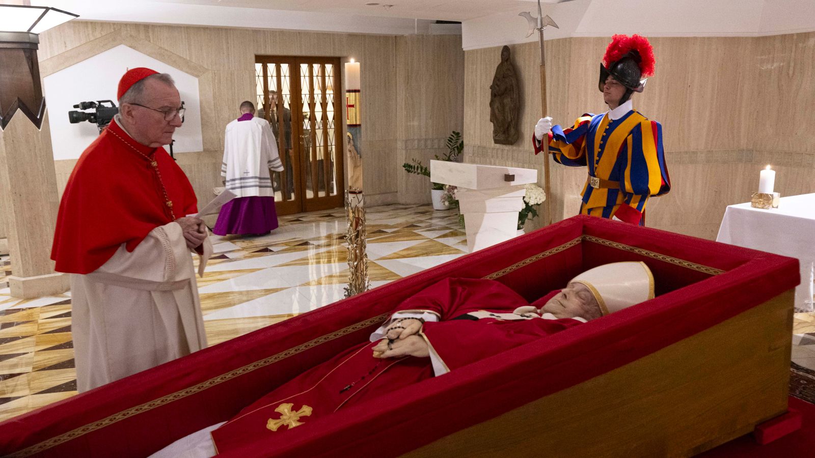 In photos: Vatican releases first images of Pope Francis resting in his ...