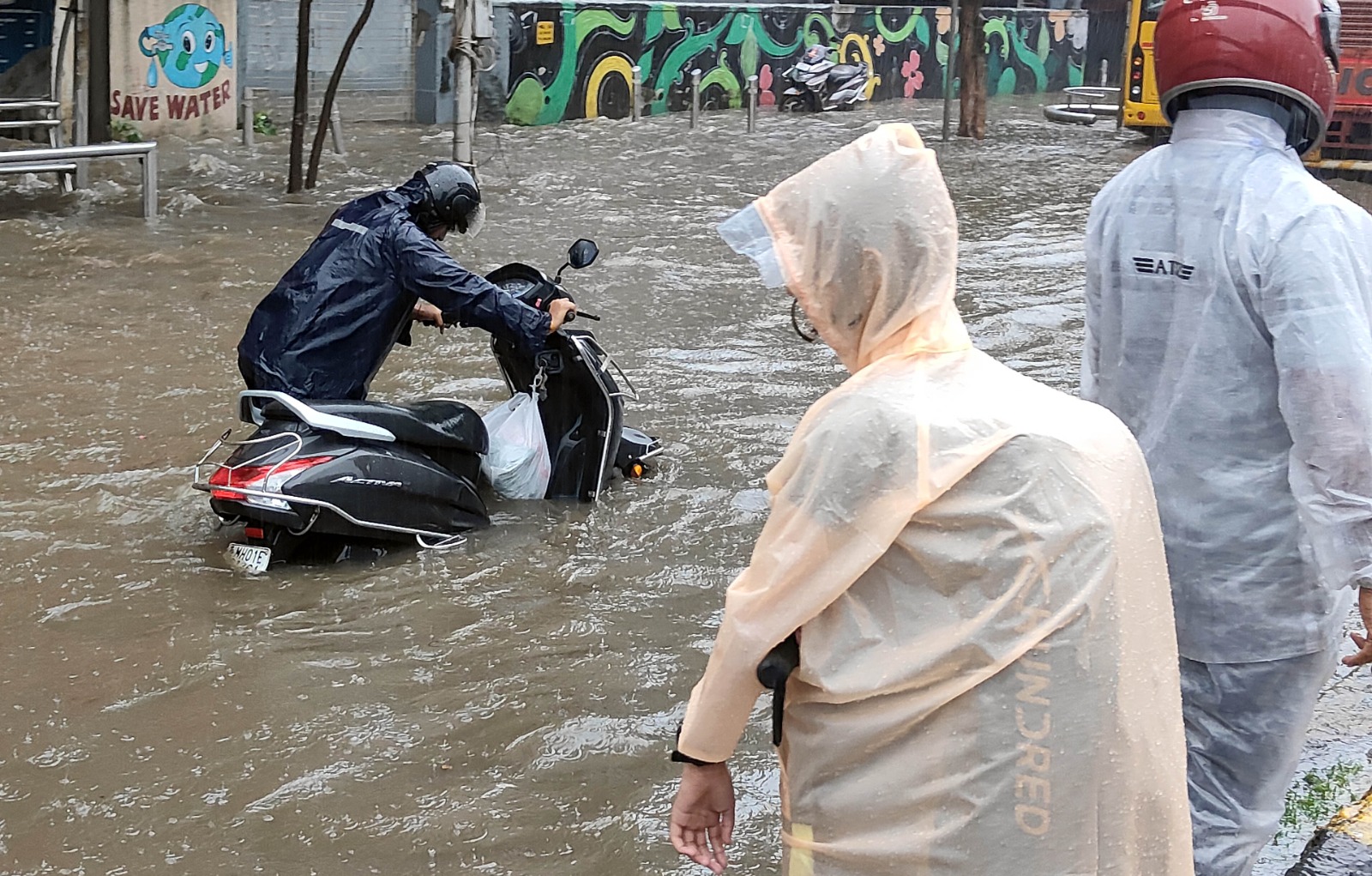 Heavy rain batters Mumbai: Streets waterlogged, local trains hit, airlines issue advisories ...